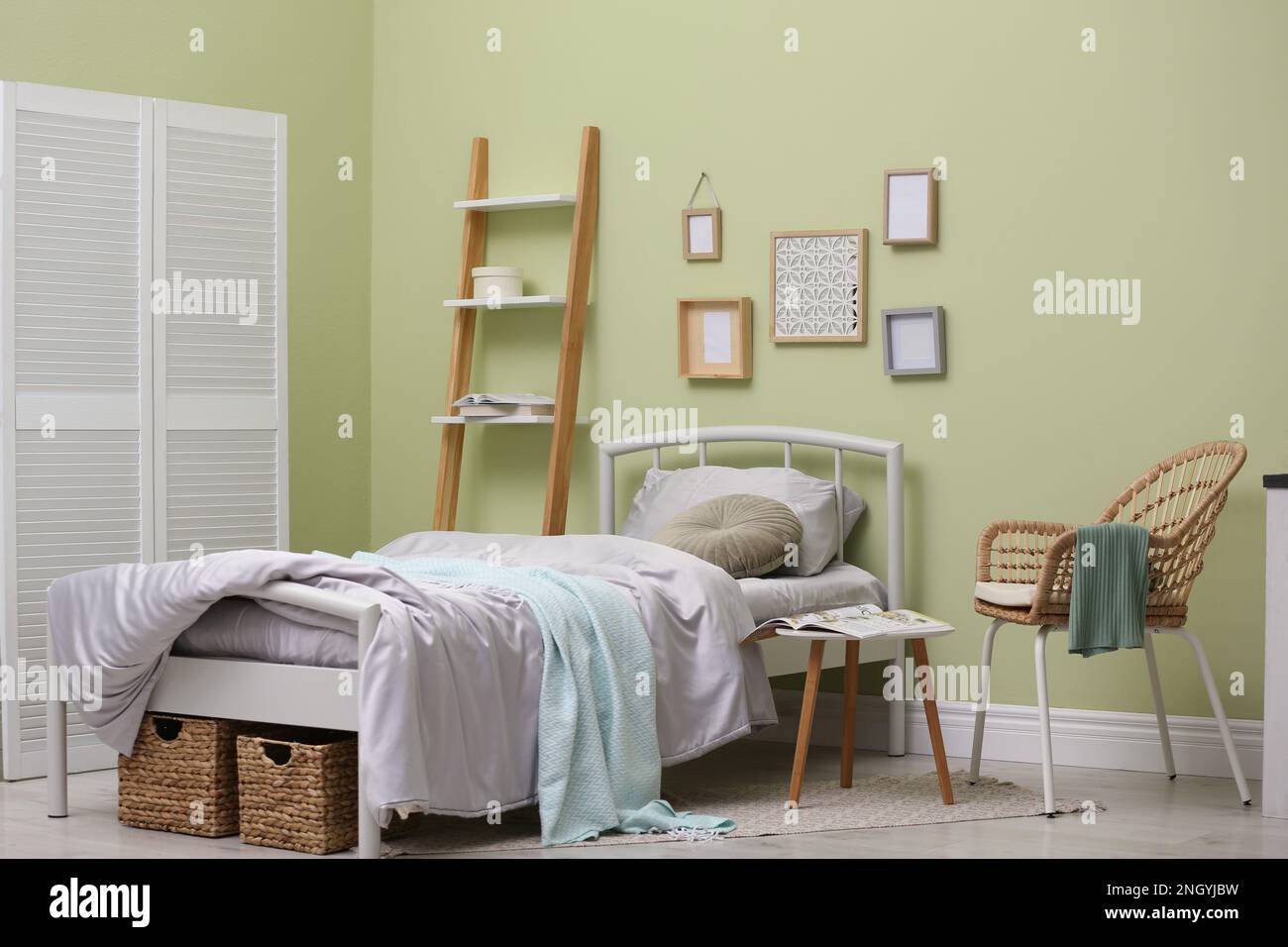 Bed with fresh linens in stylish room. Interior design Stock Photo - Alamy