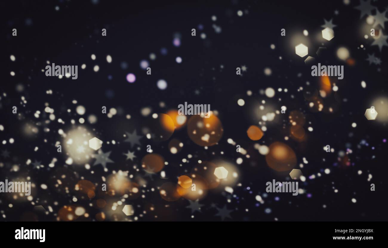 Glowing shimmer particles flying on dark background, glitter bokeh ...