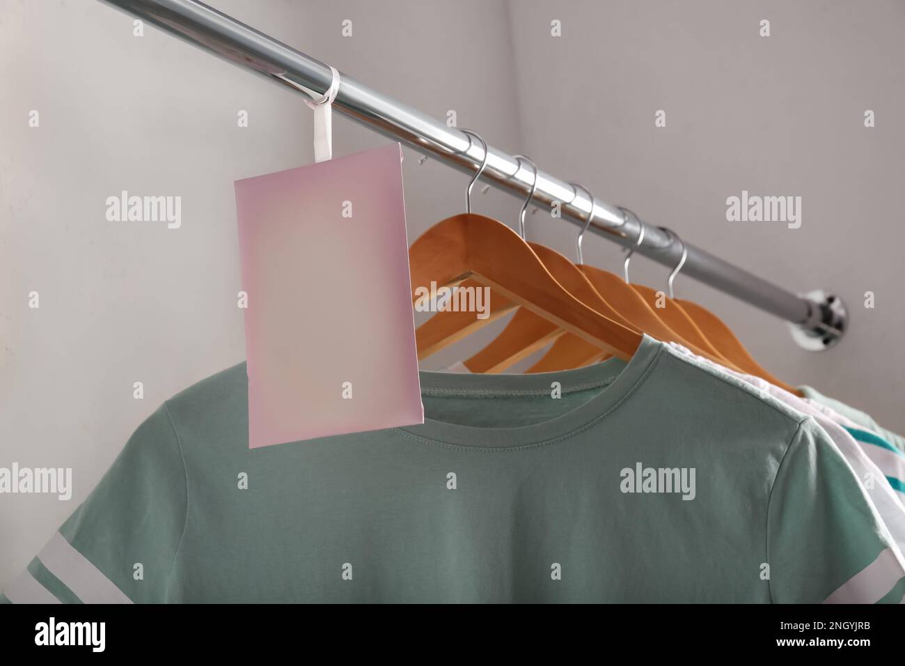 Scented sachet and clothes hanging in wardrobe Stock Photo - Alamy