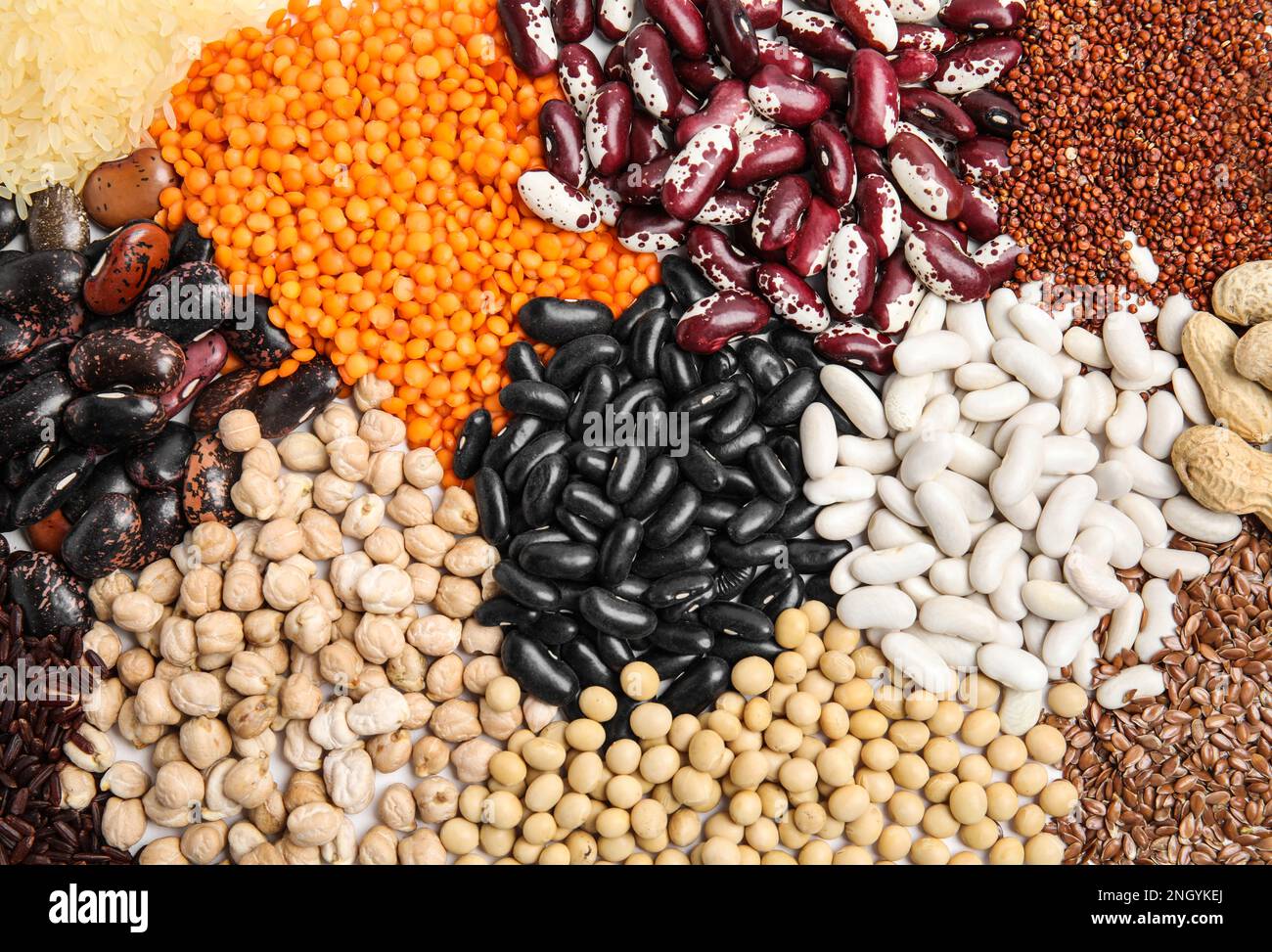 Various raw veggie seeds as background, top view Stock Photo - Alamy