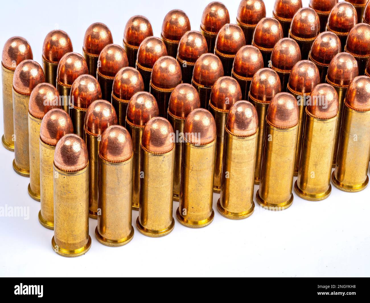 Copper and brass handgun ammunition standing at attention Stock Photo ...