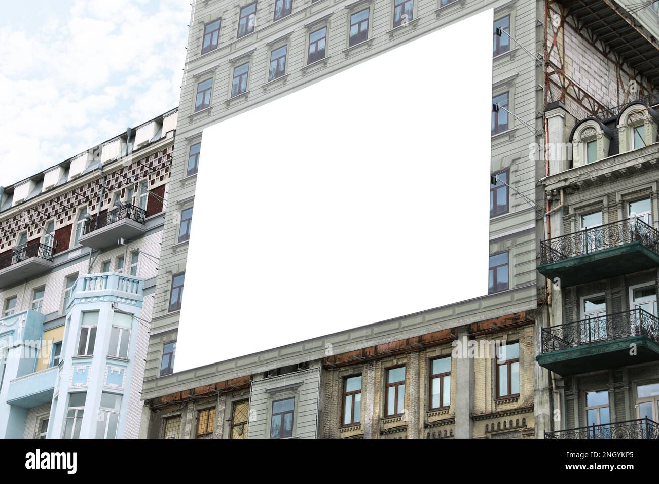 Blank banner on building facade outdoors. Advertising board design ...