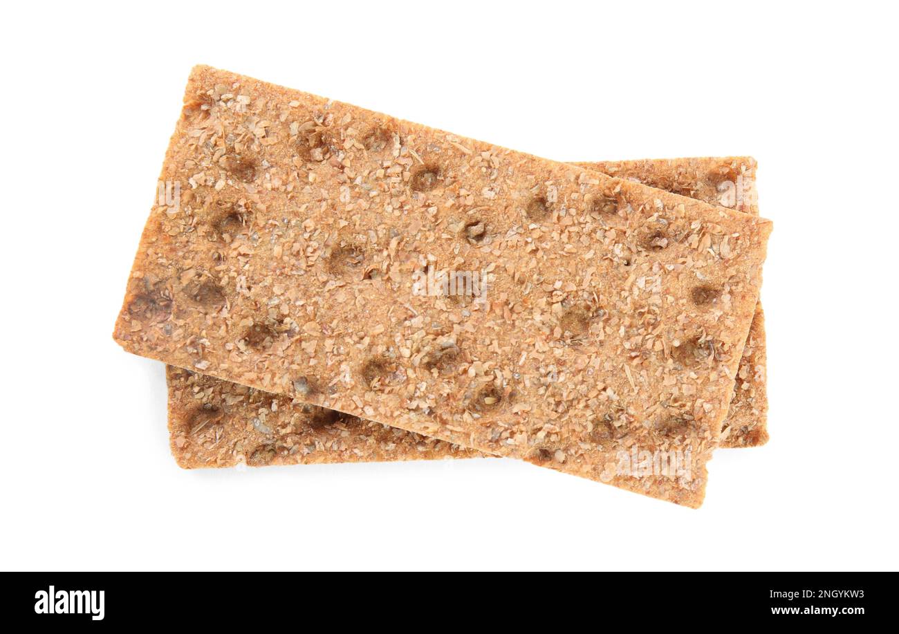 Fresh crunchy rye crispbreads on white background, top view Stock Photo ...