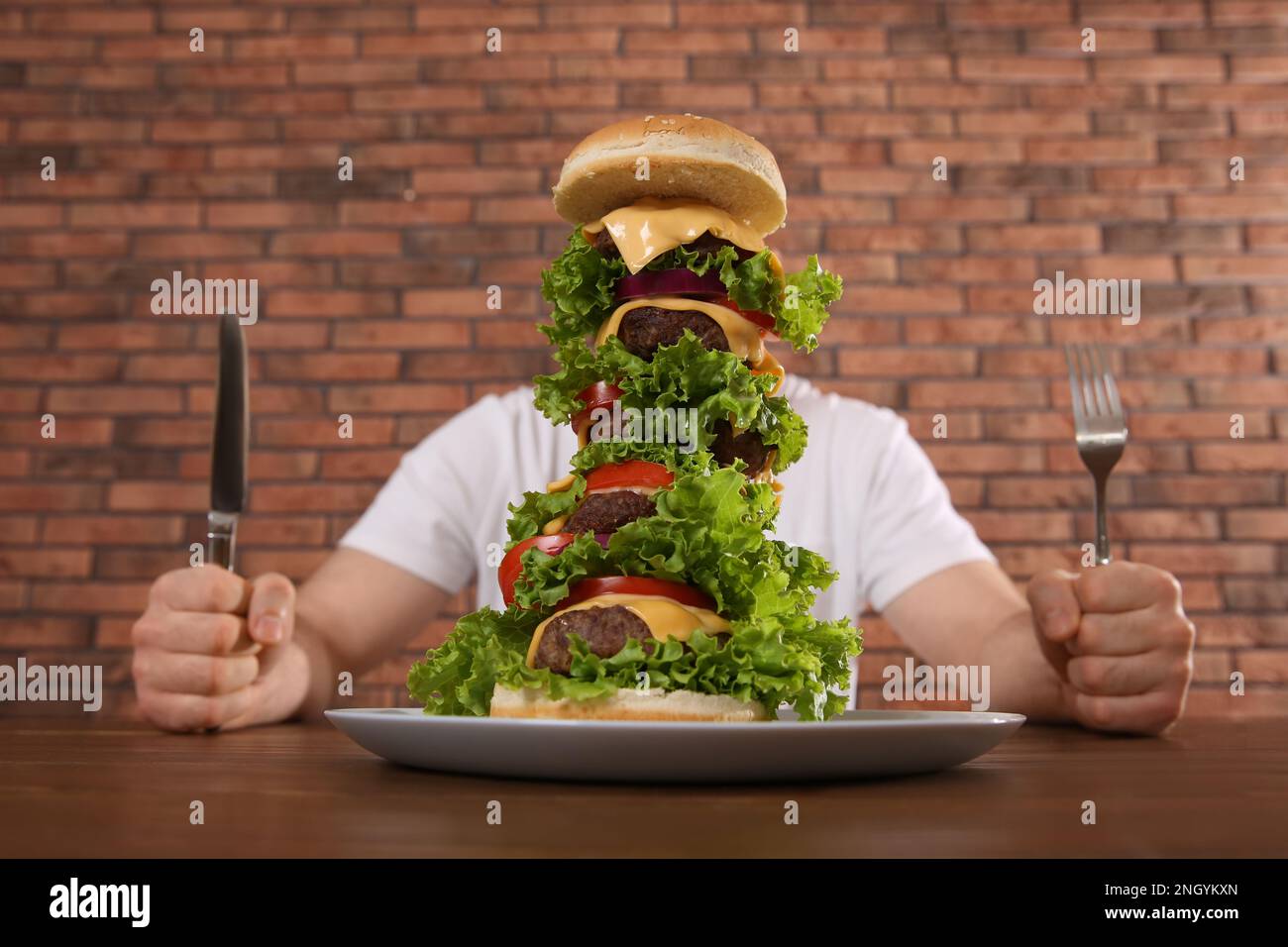 Man eating huge burger hi-res stock photography and images - Alamy