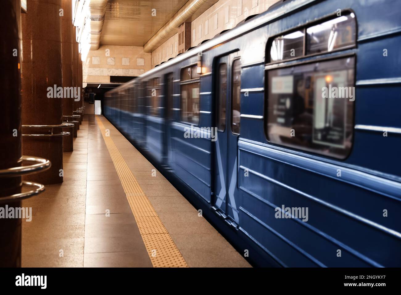 Modern subway station with blue train. Public transport Stock Photo - Alamy