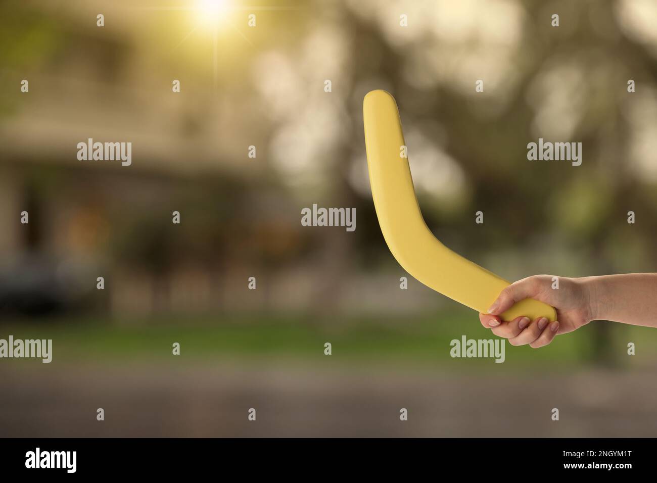 Hand holding boomerang hi-res stock photography and images - Alamy