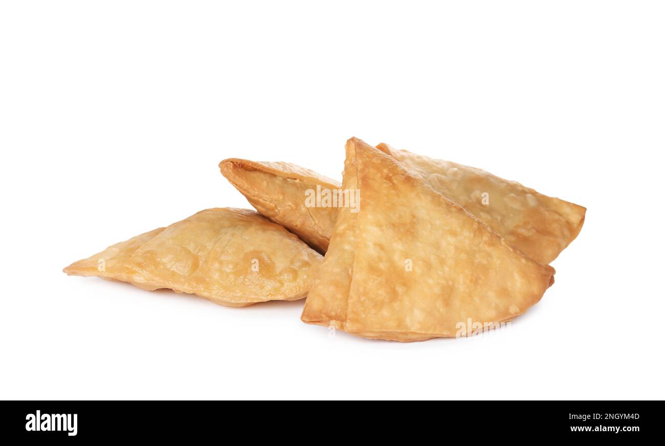 Fresh delicious crispy samosas on white background Stock Photo - Alamy