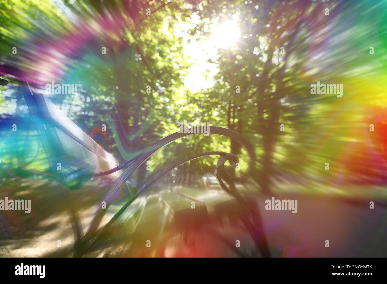 View of bench in park and flashing lights effect. Migraine aura ...