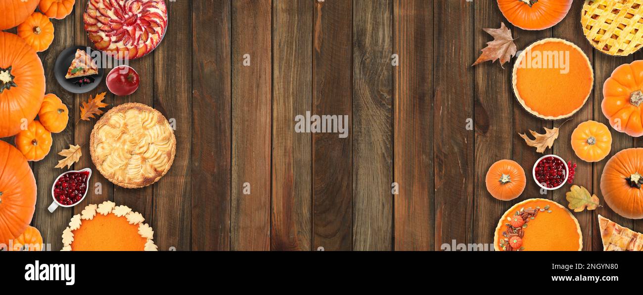 Flat lay composition with different tasty pies on wooden table, space ...