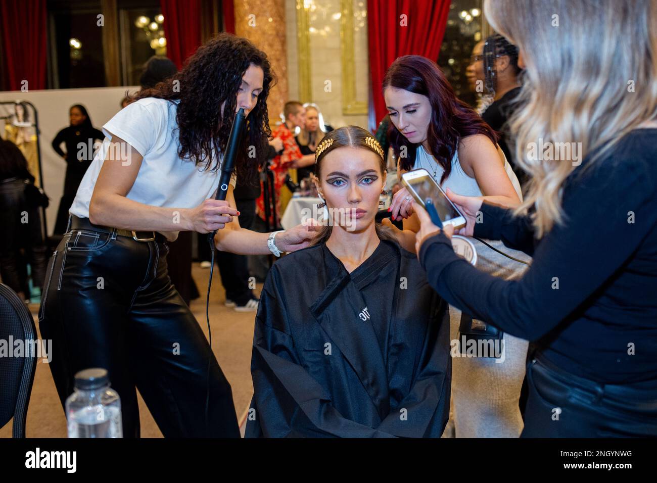 London, UK. Sunday 19th February 2023. A model backstage at the ...