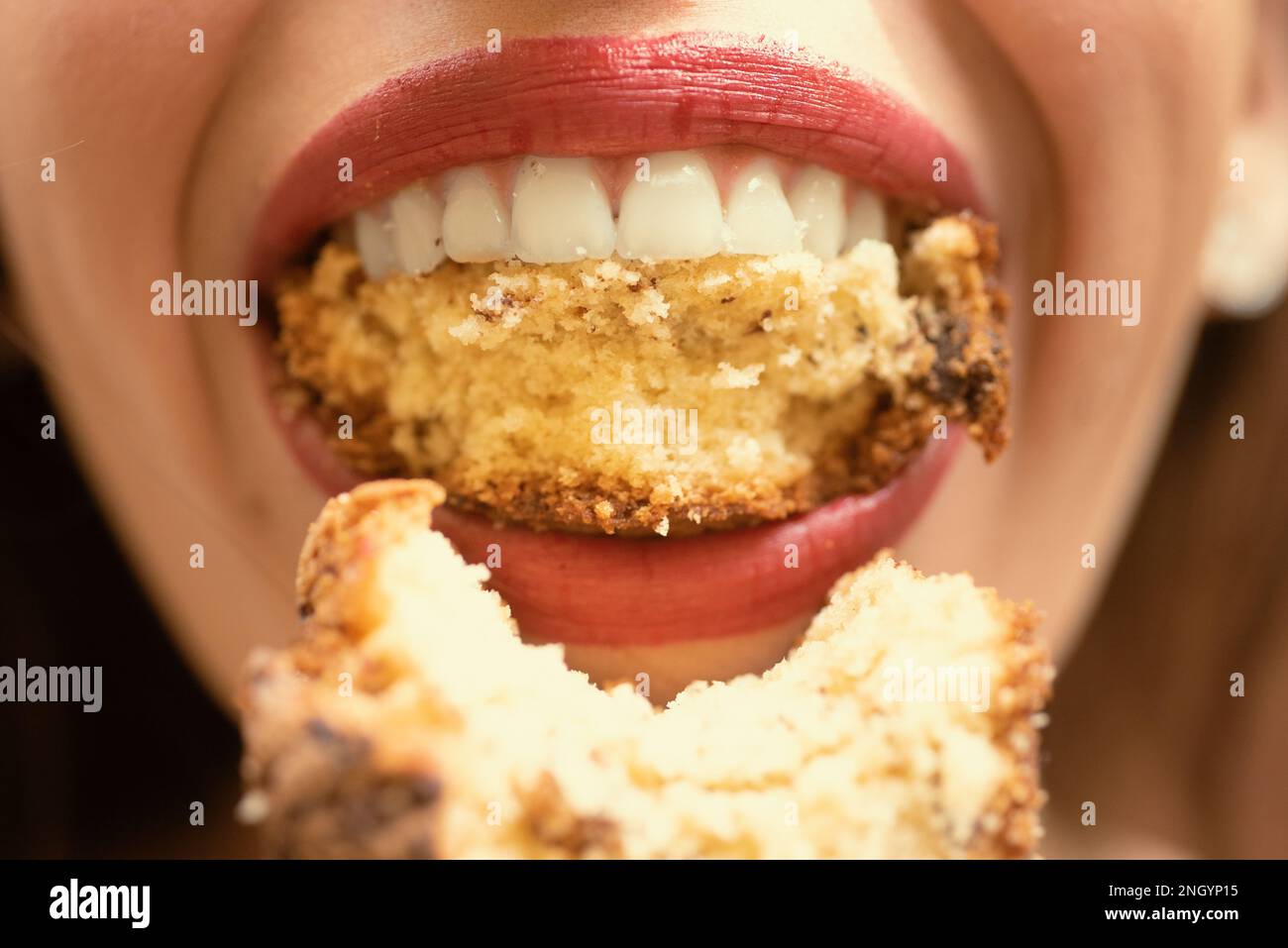 Hunger. Closeup of woman eating. Meal. Female lips. Closeup woman face ...
