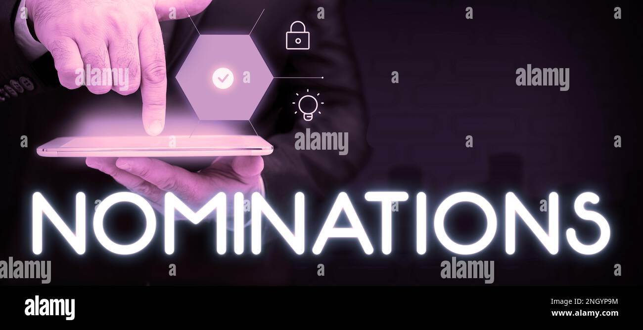 Hand writing sign Nominations. Word Written on the act of officially ...