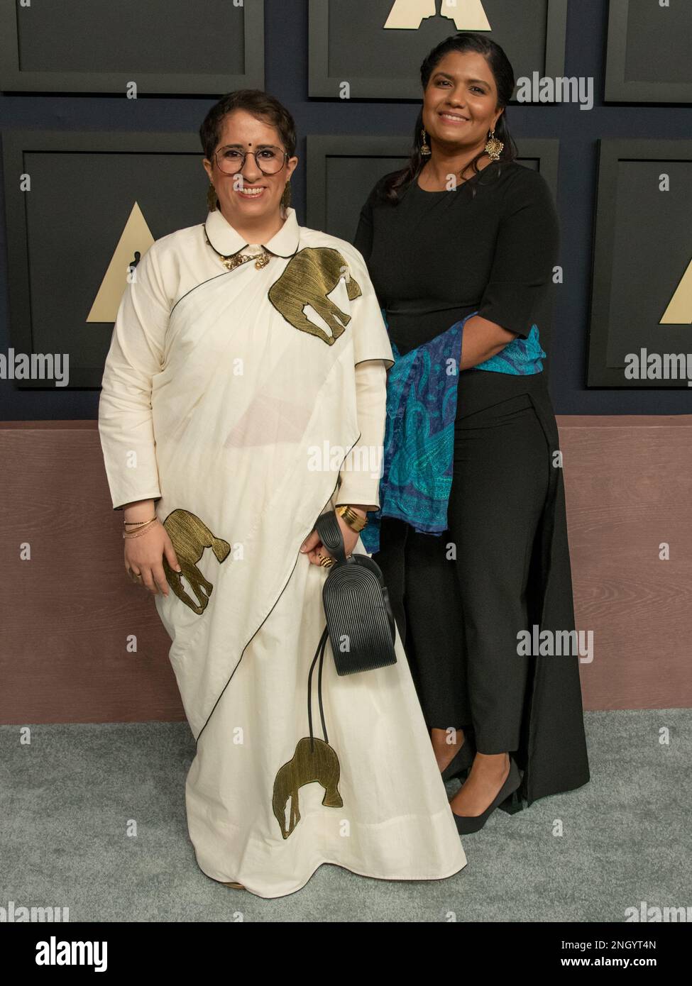 February 13, 2023, Beverly Hills, California, USA: Guneet Monga and ... February 13, 2023, Beverly Hills, California, USA: Guneet Monga and ...