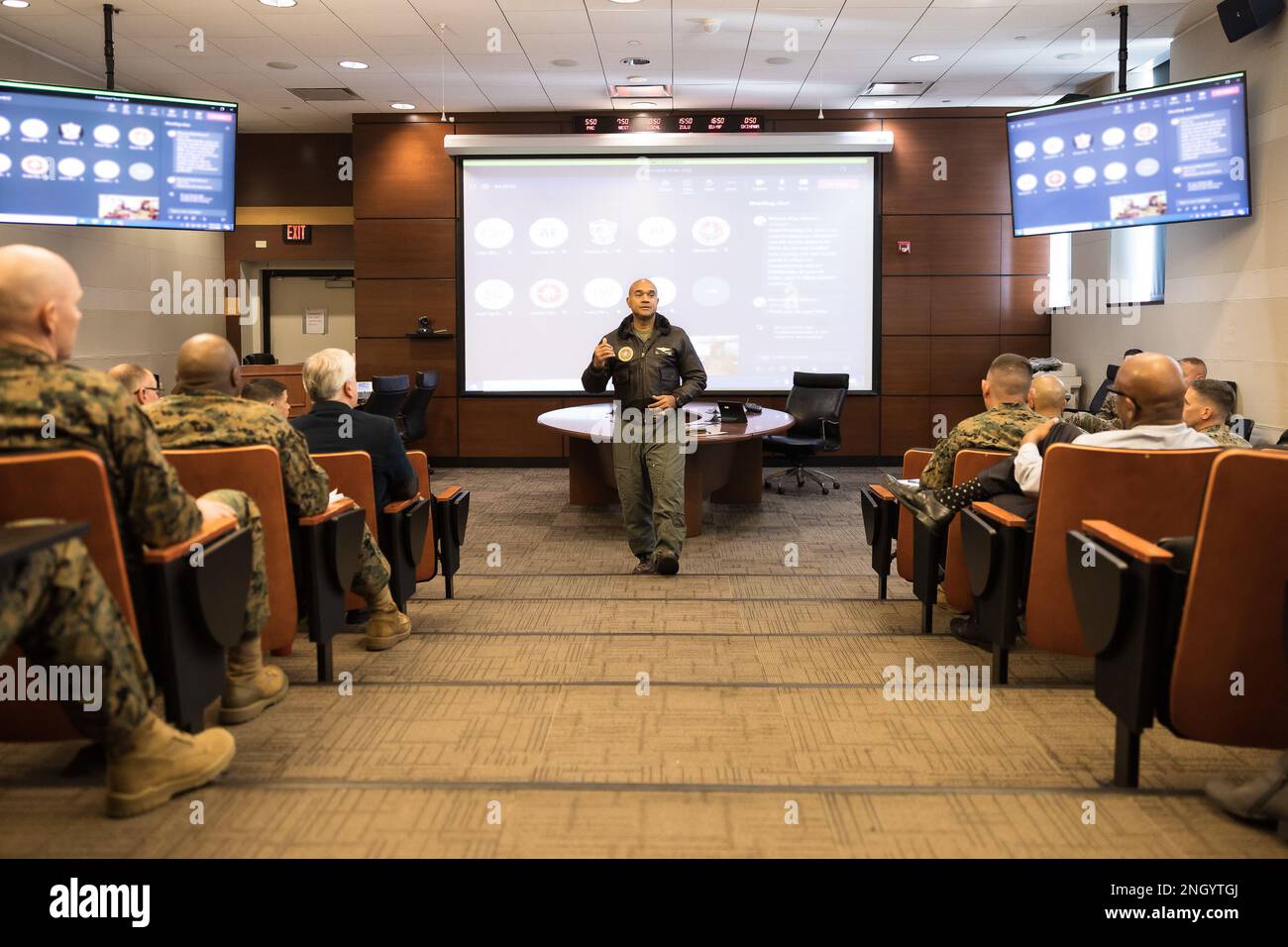 U.S. Marine Corps Lt. Gen. Brian W. Cavanaugh, center, the commanding ...