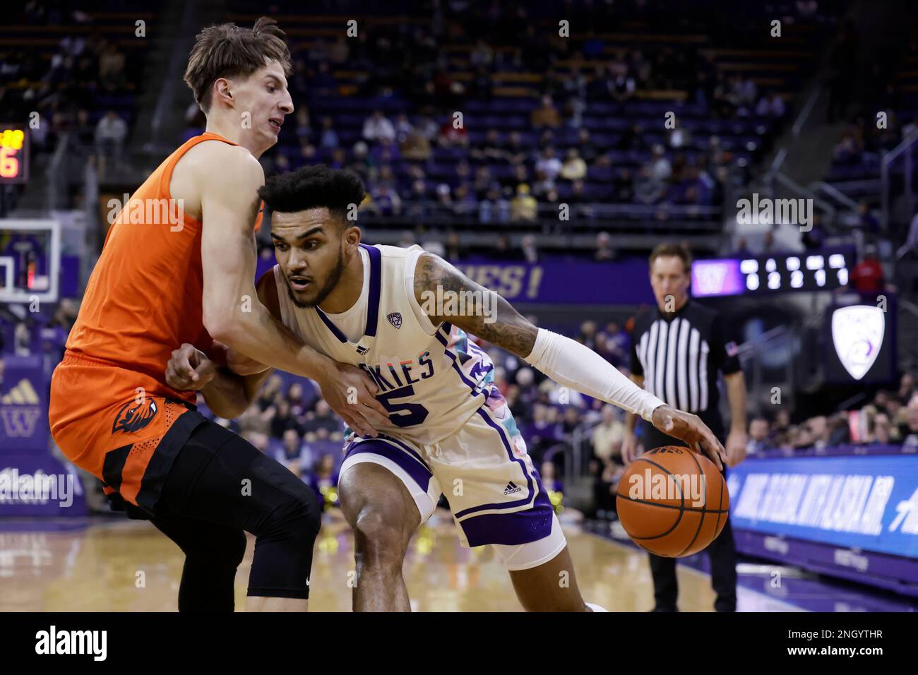 Washington guard Jamal Bey drives into Oregon State forward Dzmitry ...