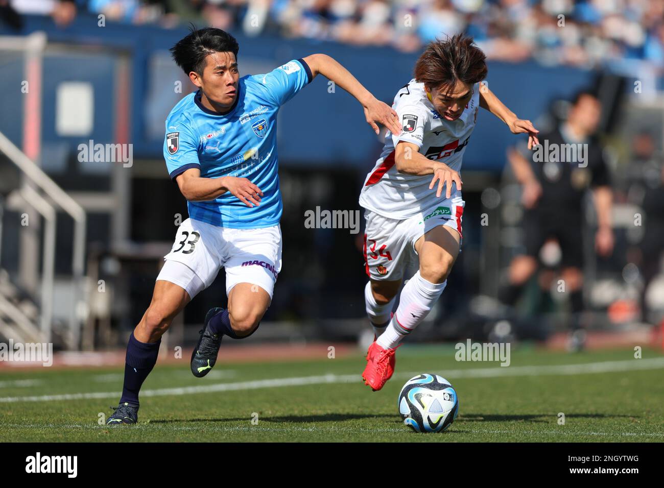 Kanagawa, Japan. 18th Feb, 2023. (L-R) Tomoki Kondo (Yokohama FC), Takuya Uchida (Grampus ...
