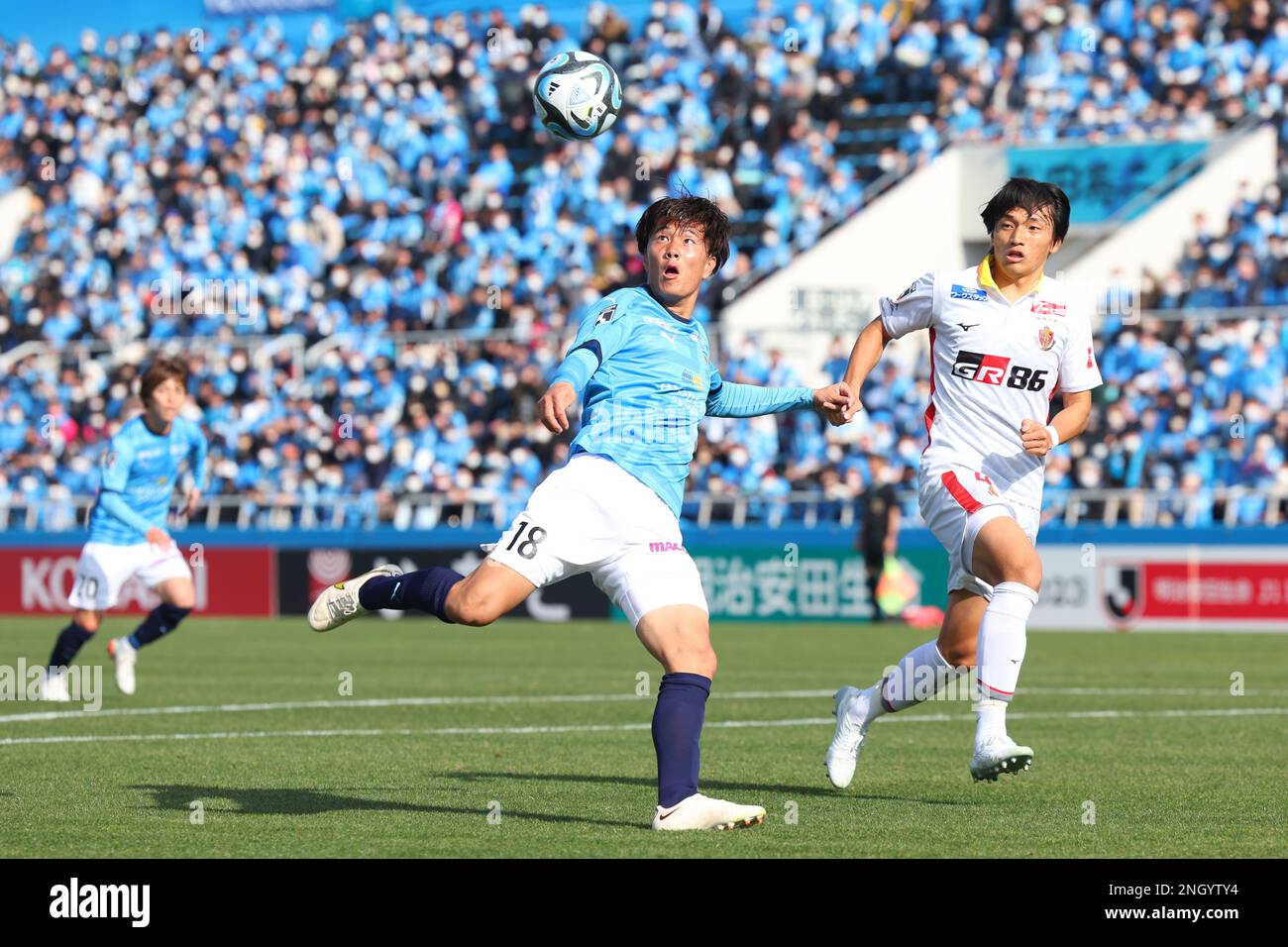 Kanagawa, Japan. 18th Feb, 2023. (L-R) Koki Ogawa (Yokohama FC), Yuichi Maruyama (Grampus ...