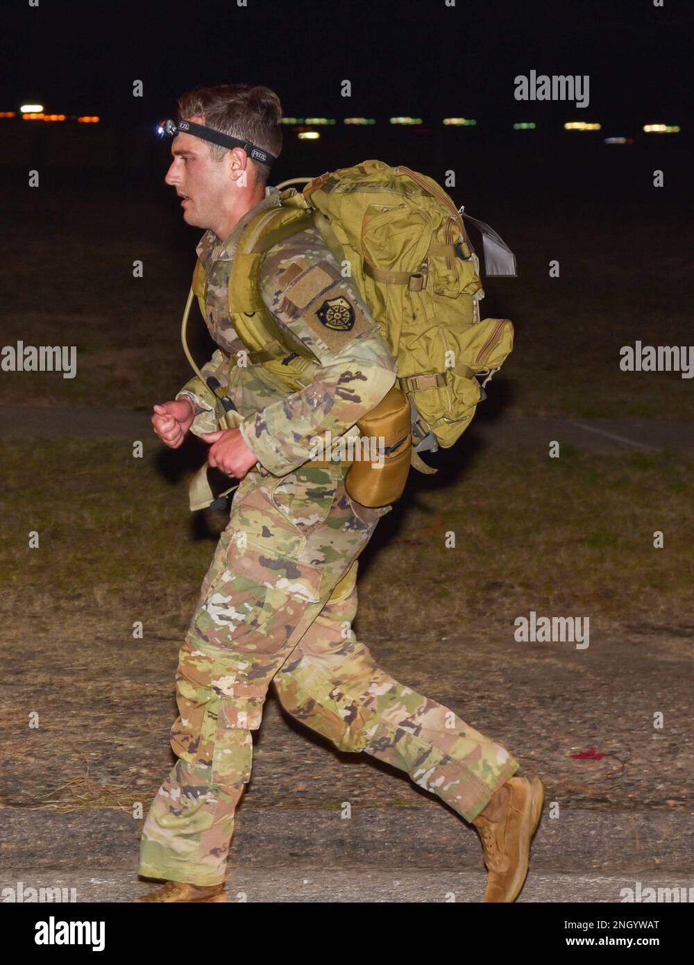 A Cyber Protection Brigade Soldier runs to the finish line to complete ...