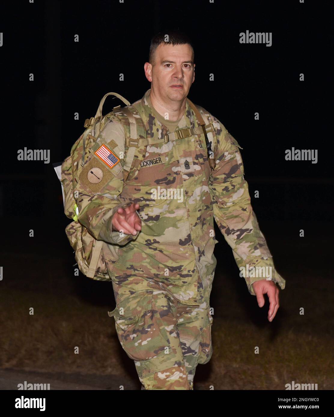Cyber Protection Brigade Command Sgt. Maj. Kevin Flickinger motions ...