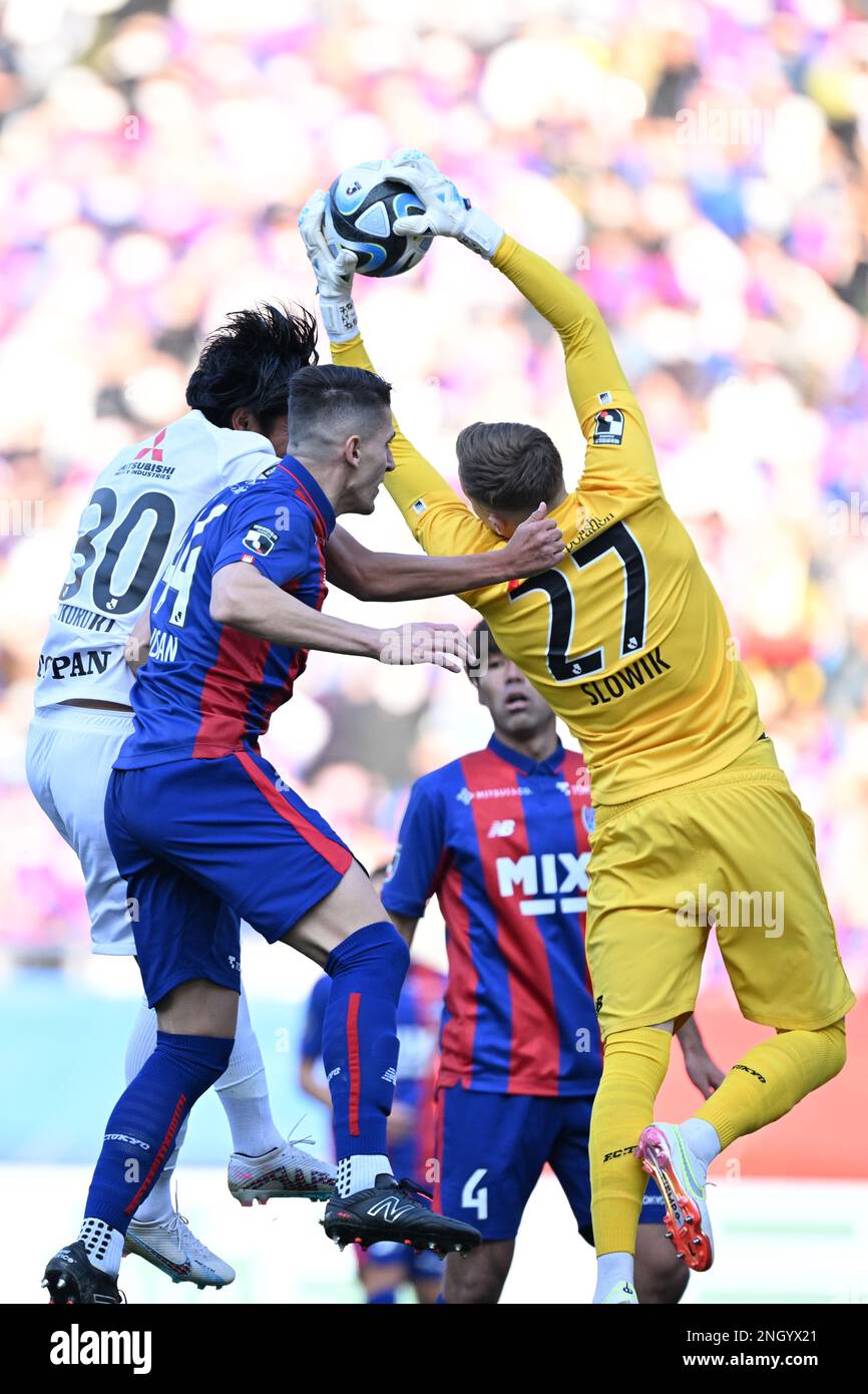 Ajinomoto Stadium, Tokyo, Japan. 18th Feb, 2023. (L-R) Shinzo Koroki (Reds), Henrique Trevisan ...