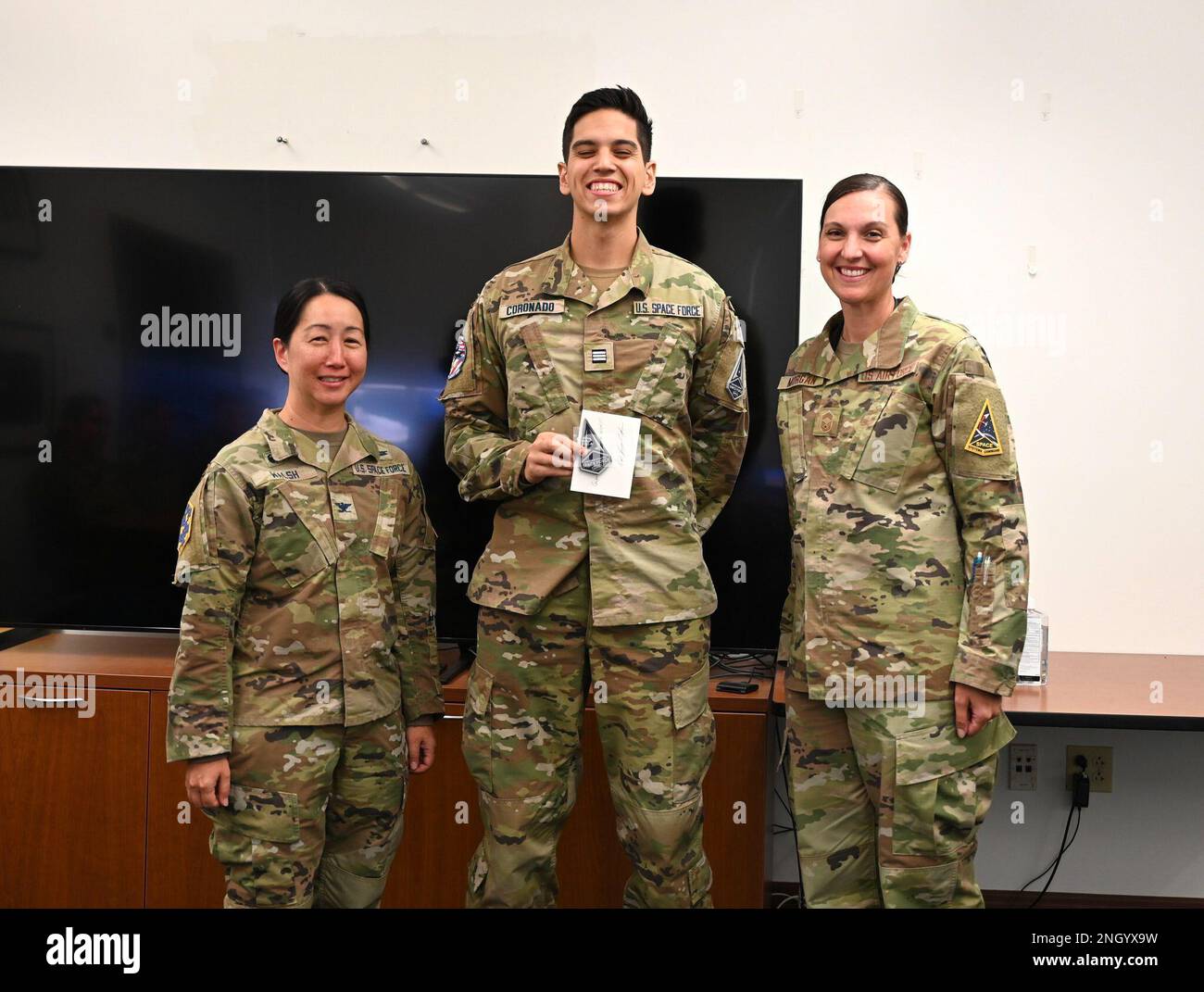 Cadet Coronado poses for a picture with SBD 3 Commander, Col. Mia Walsh ...
