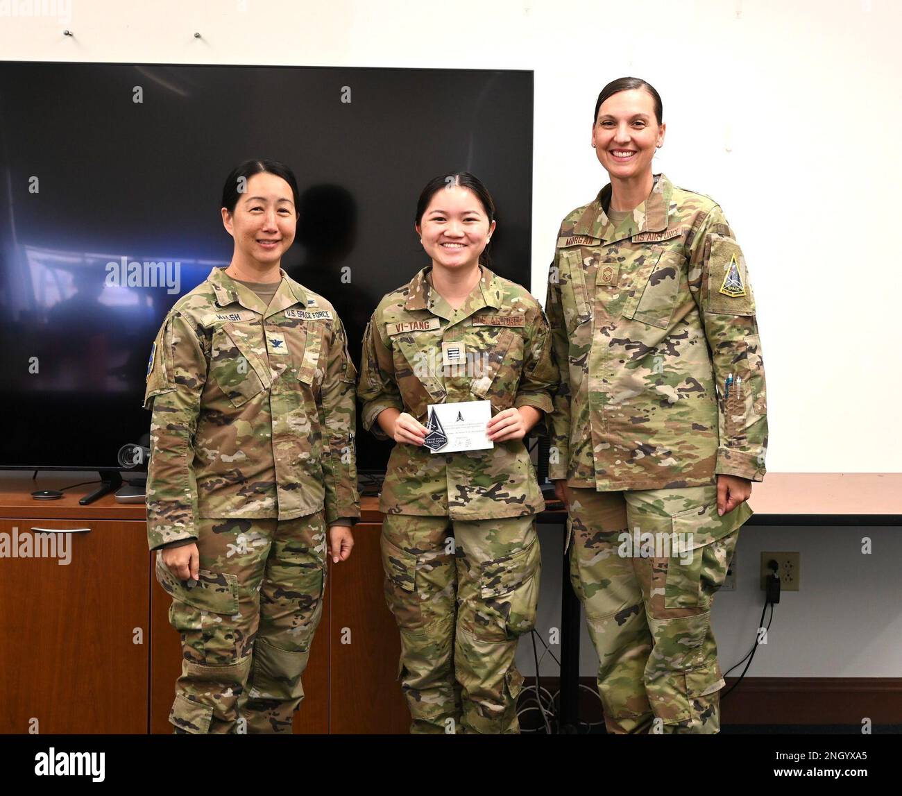Cadet Vi-Tang poses for a picture with SBD 3 Commander, Col. Mia Walsh ...