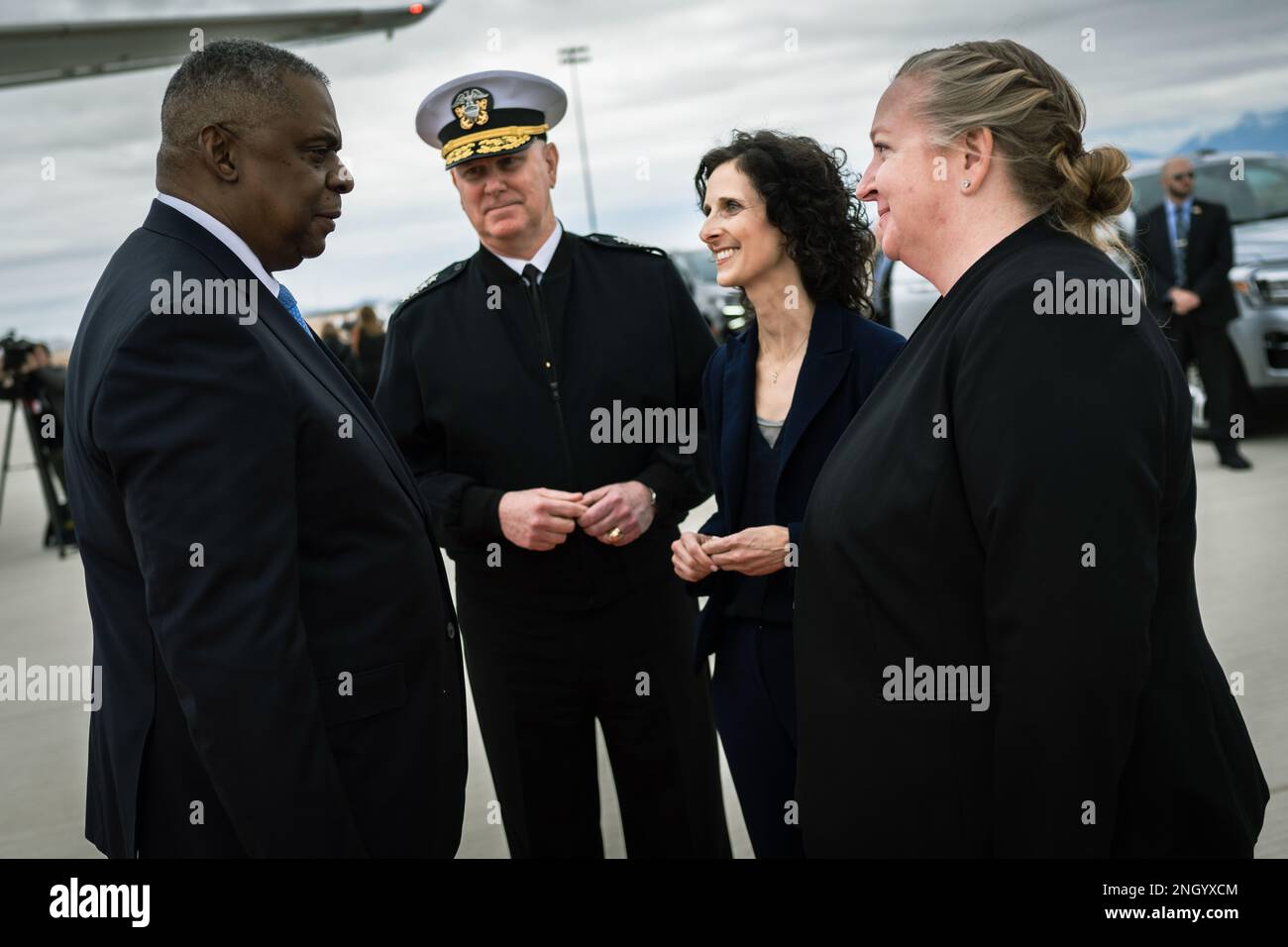 Secretary of Defense Lloyd J. Austin III is greets Adm. Christopher W ...