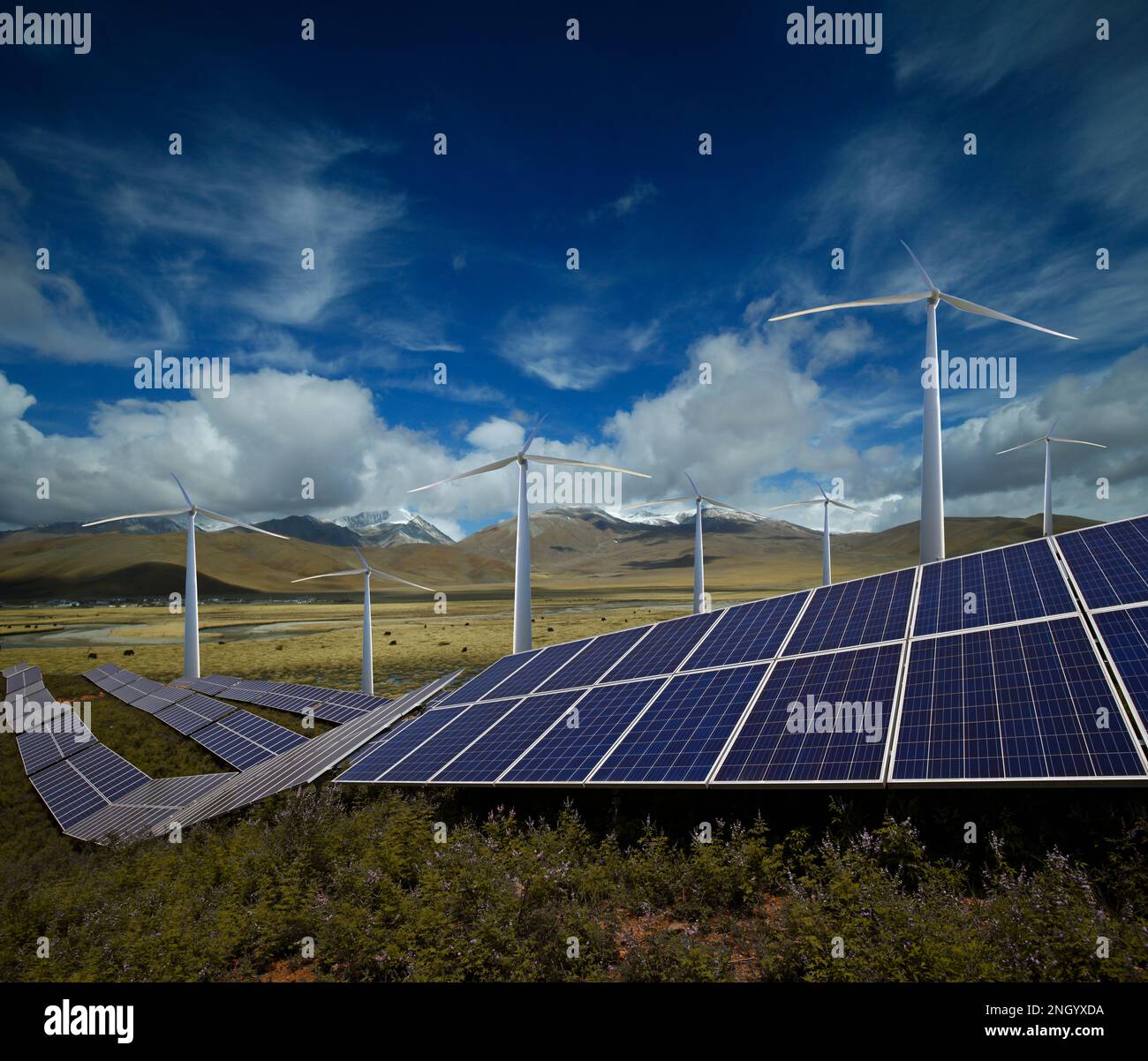 Solar photovoltaic panels and wind turbines. Energy concept Stock Photo ...