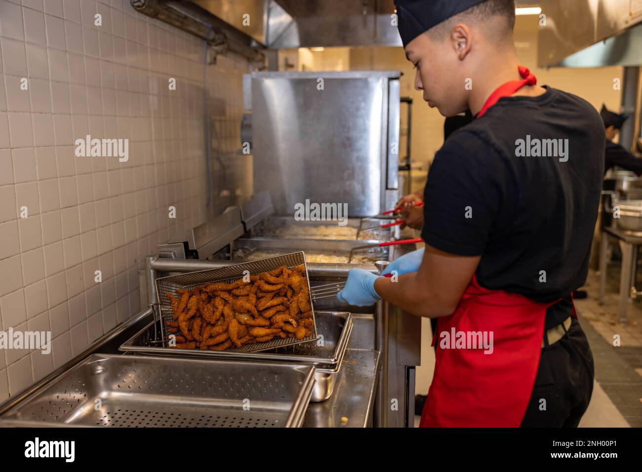 U.S. Marine Corps Pfc. Edriel Vegavalentin, a food service Marine with ...