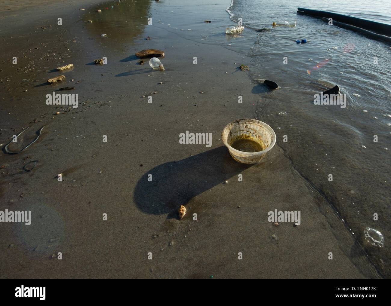Plastic waste on the beach in Thailand carried by the tide and ...