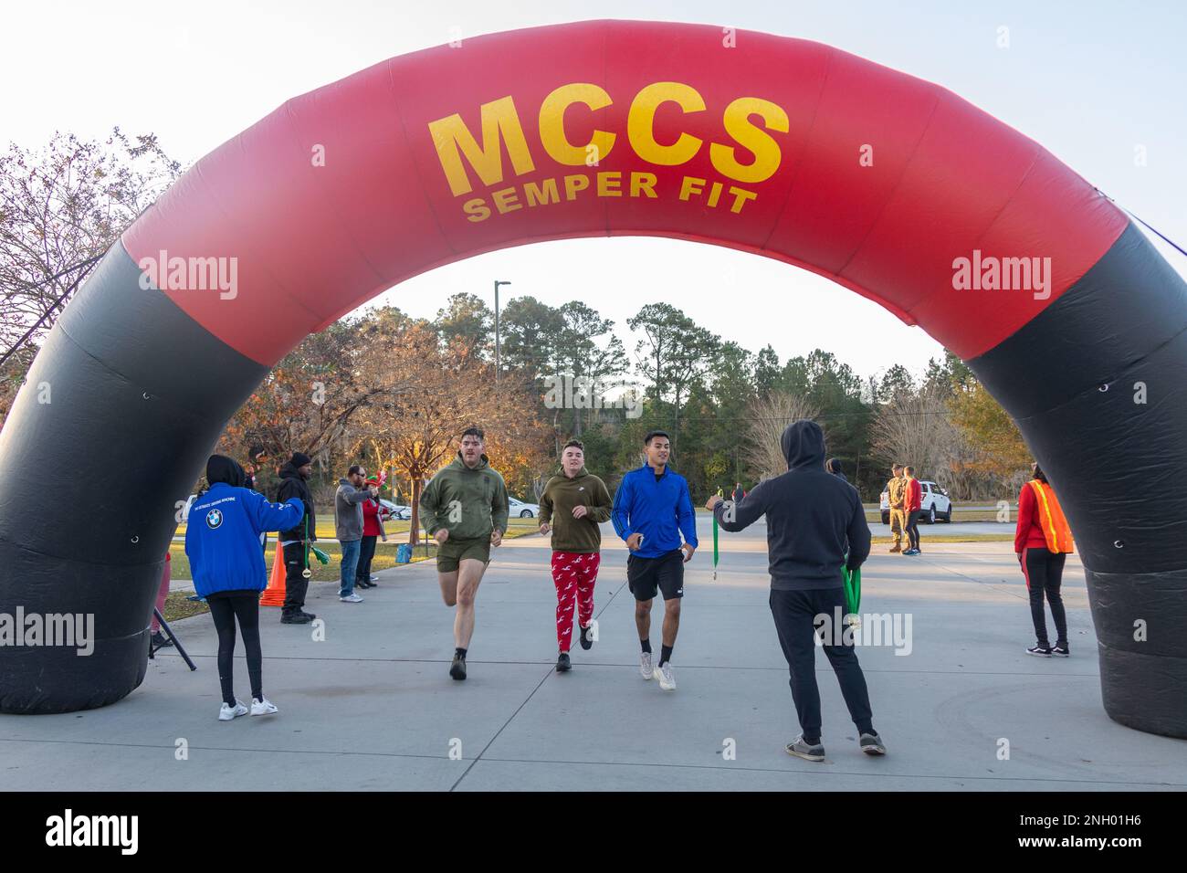 U.S. Marines with Marine Corps Air Station (MCAS) Beaufort cross the ...
