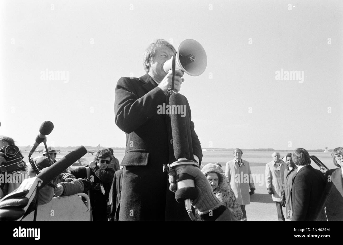 President elect Jimmy Carter uses a bullhorn to speak to assembled well ...