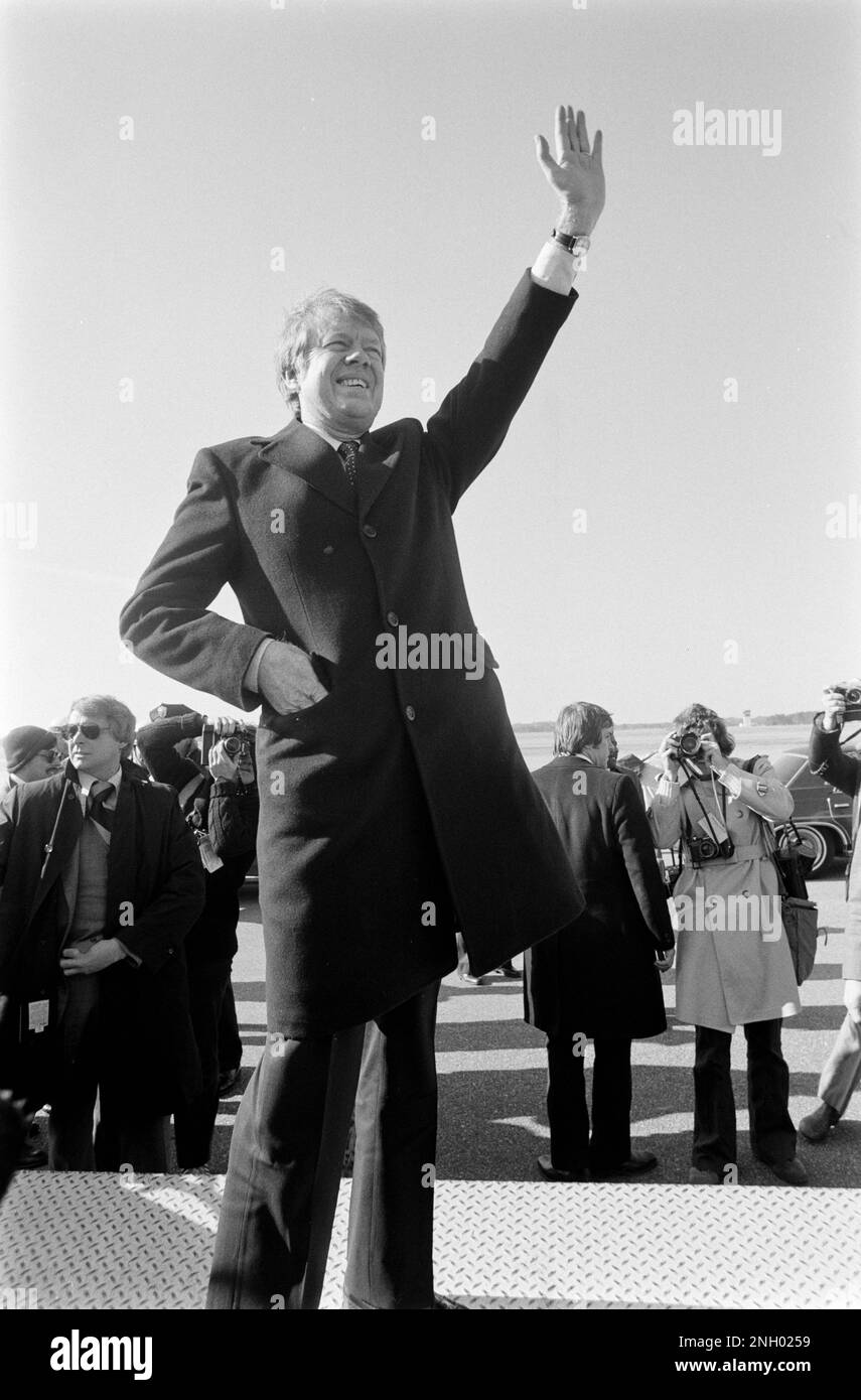 President elect Jimmy Carter uses a bullhorn to speak to assembled well ...
