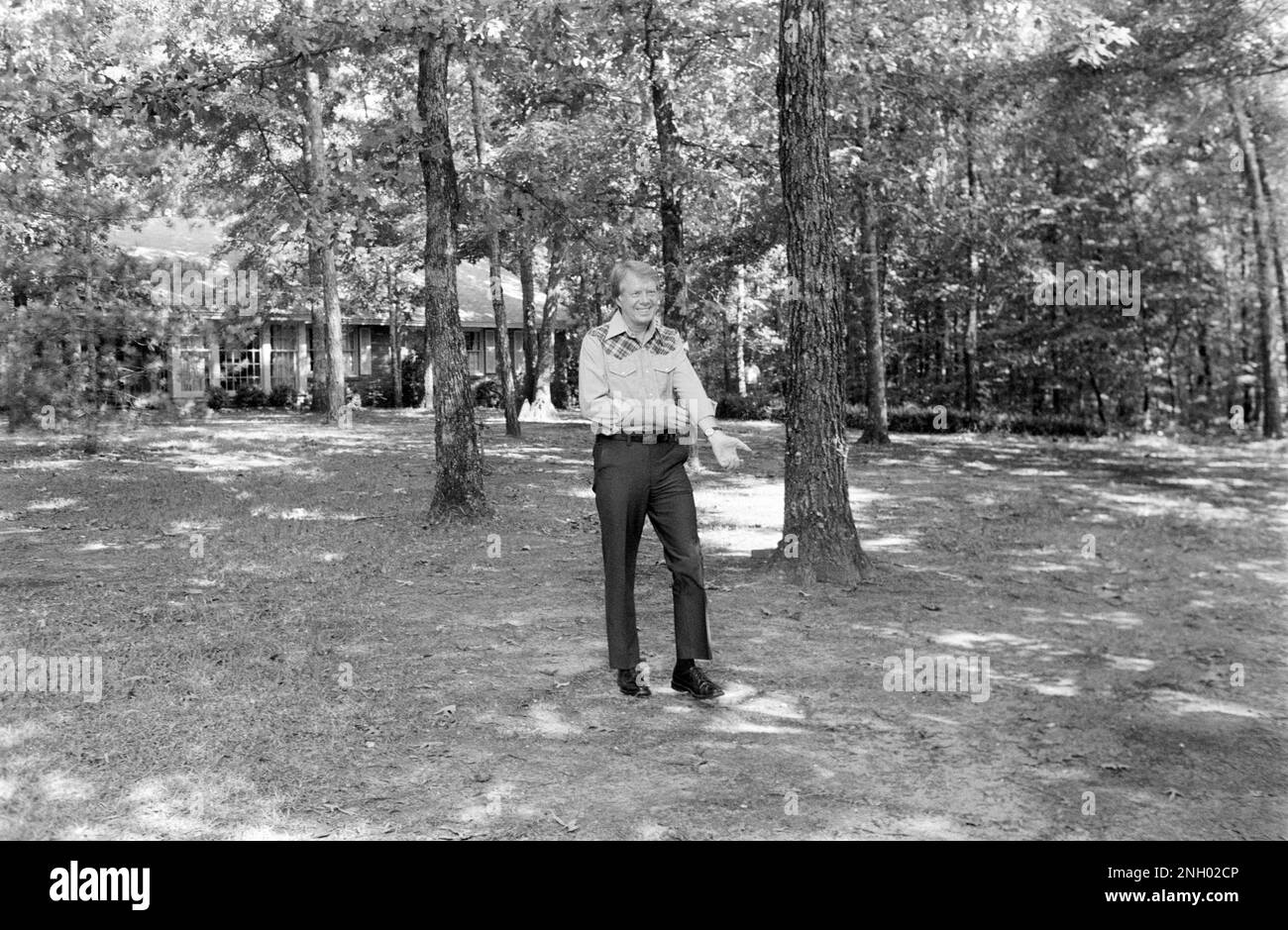 Democratic Presidential nominee Jimmy Carter walks in the front yard of ...