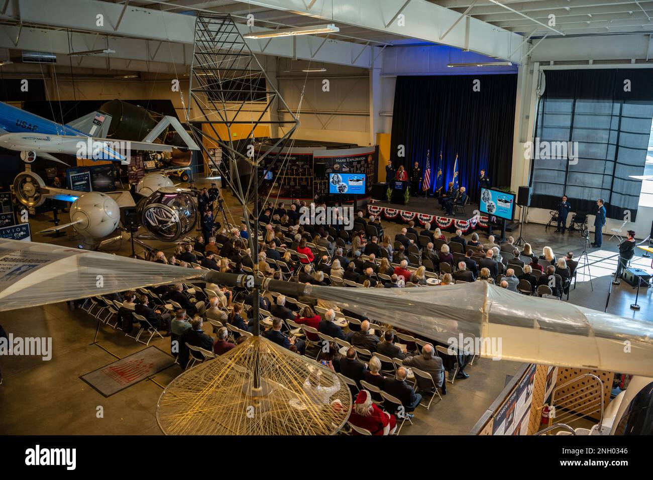 Connie Bowlin, podium, a close friend of retired Col. Clarence E. “Bud ...