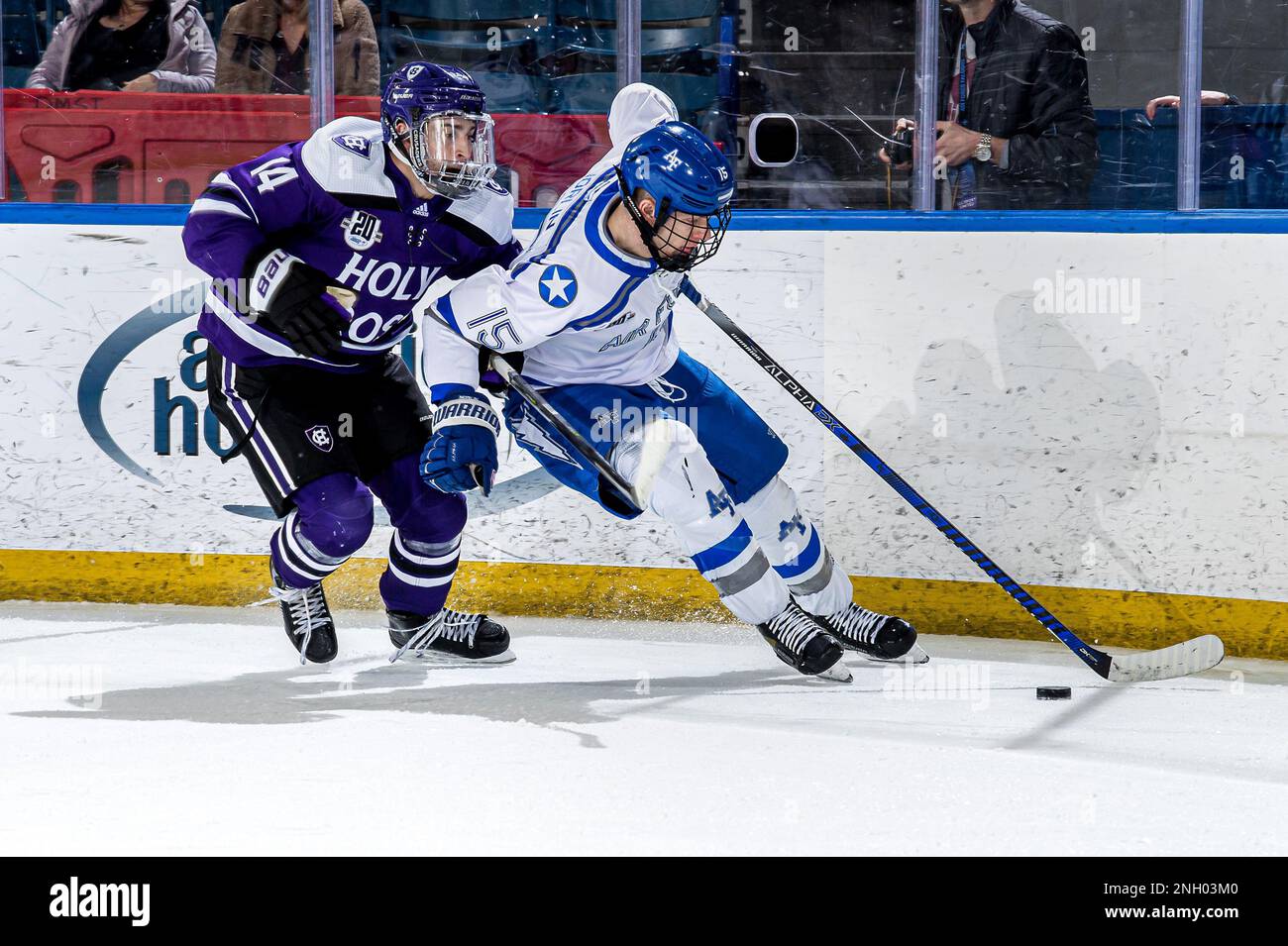 U.S. Air Force Academy -- Air Force's Bennett Norlin keeps the puck ...