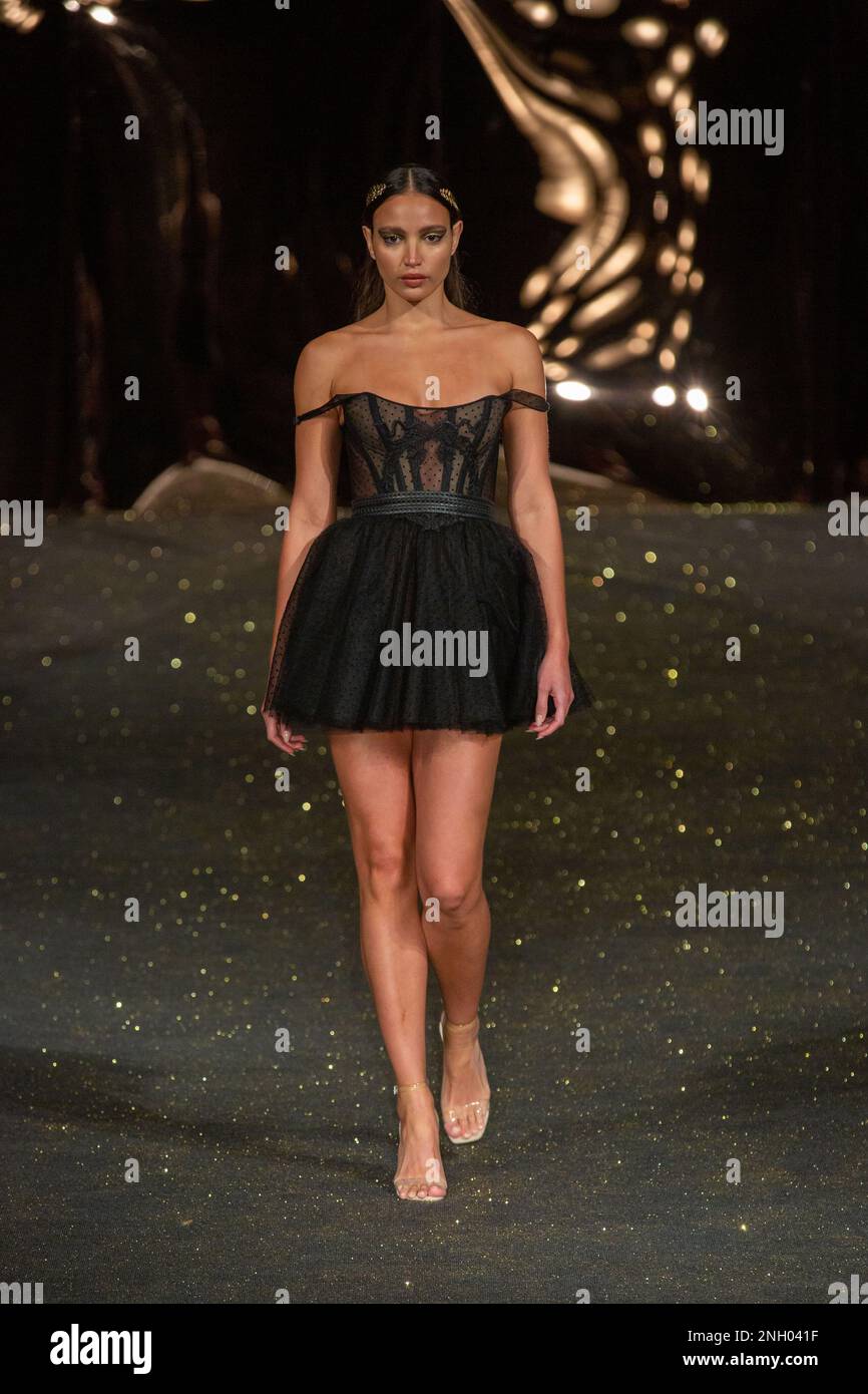 London, UK. 19th Feb, 2023. A model walks the runway at the Autumn ...