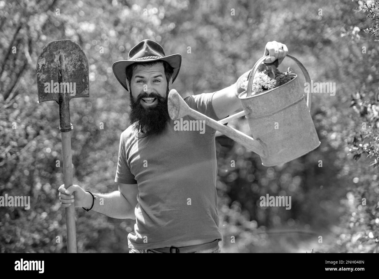 Crazy Farmer with Shovel and watering can. Garden man with tools Stock ...