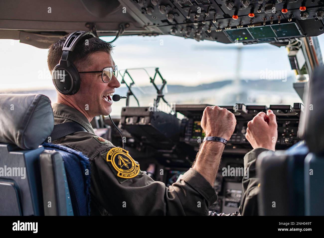 U.S. Air Force Maj. Richard Margerison, left, 21st Airlift Squadron C ...