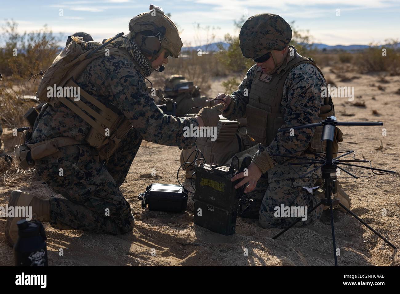 U.S. Marine Corps Staff Sgt. Robert Eden (left), an air traffic control ...