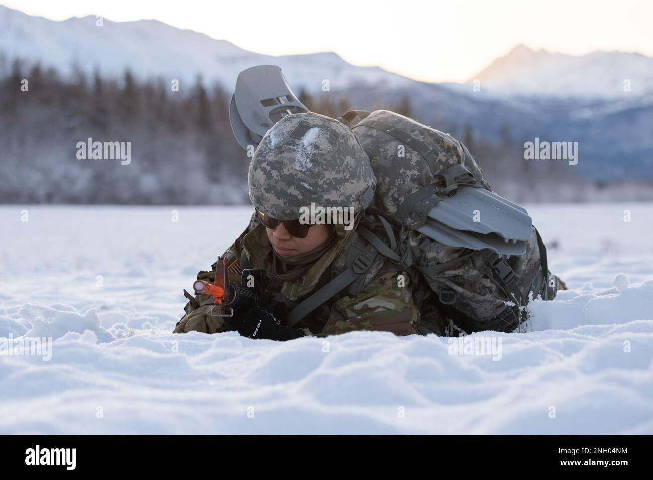 A University of Alaska Army ROTC cadet provides security while ...