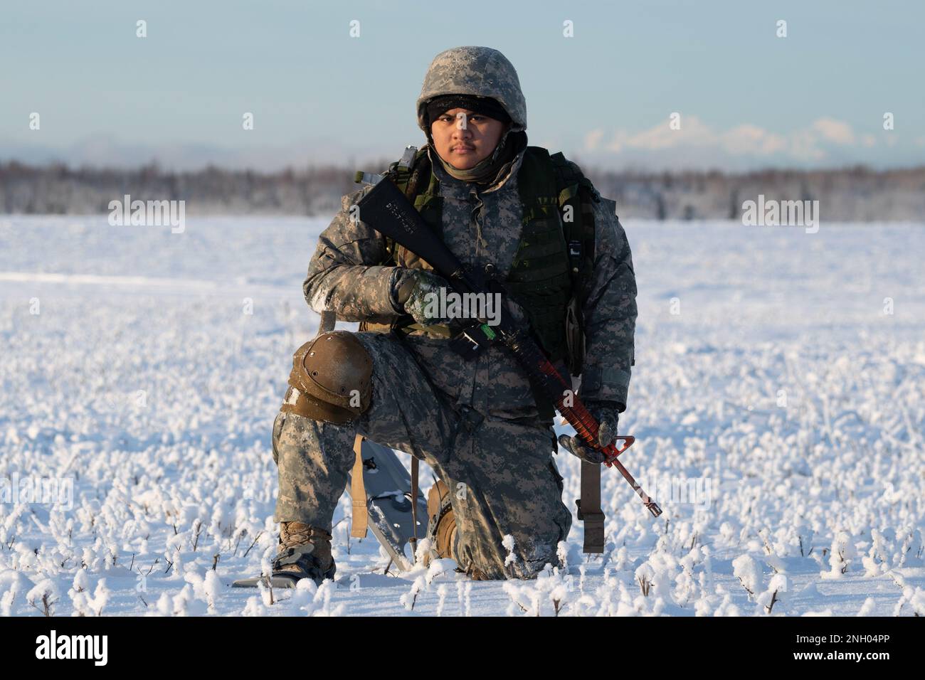 A University of Alaska Army ROTC cadet provides security while ...