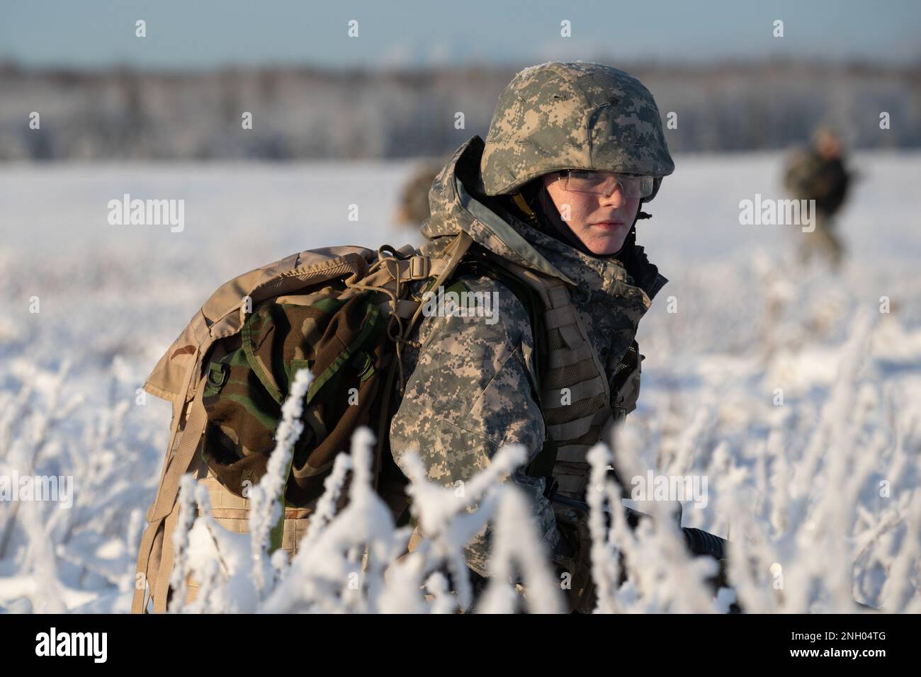 A University of Alaska Army ROTC cadet provides security while ...