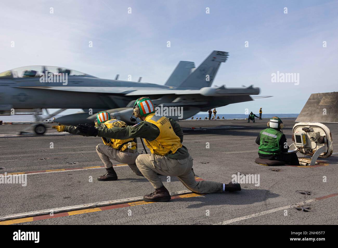 Lt. Cmdr. Andrew Castro, front, from Knoxville, Tenn., and Lt. Bartley ...