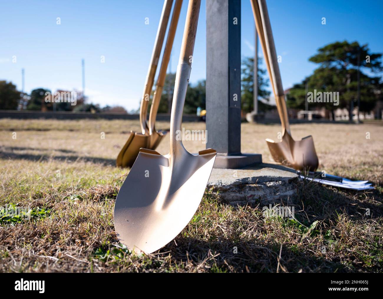 Ceremonial shovels rest against a light pole during the Arbor Day ...