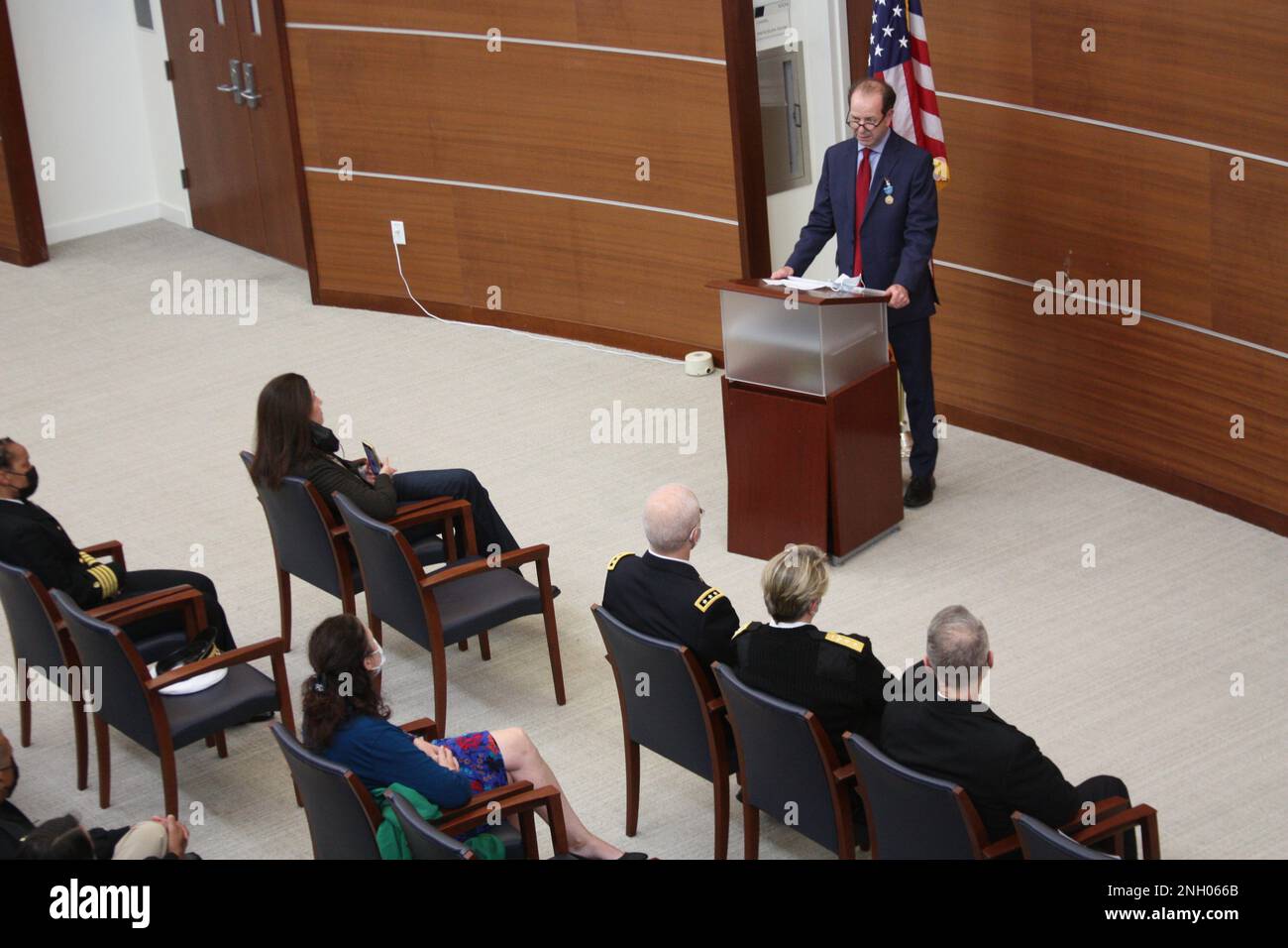 Dr. Louis French (standing at podium), deputy director of the National ...