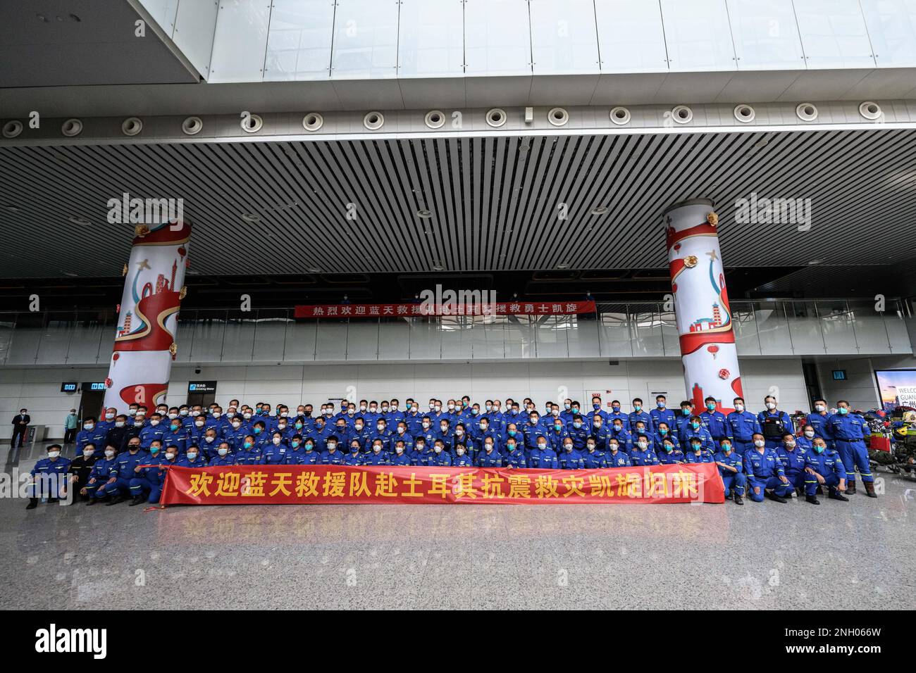 Rescuers of the Chinese Blue Sky Rescue Team arrive at Guangzhou Baiyun ...