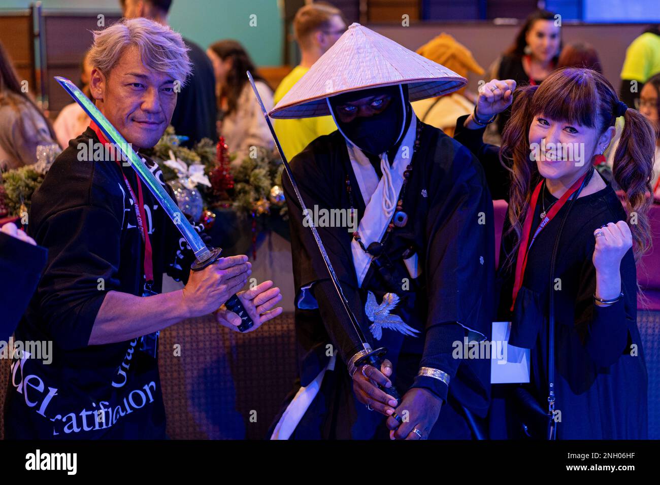 Anri Katsu, left, an actor, an attendee, center, and Mika Kanai, an ...