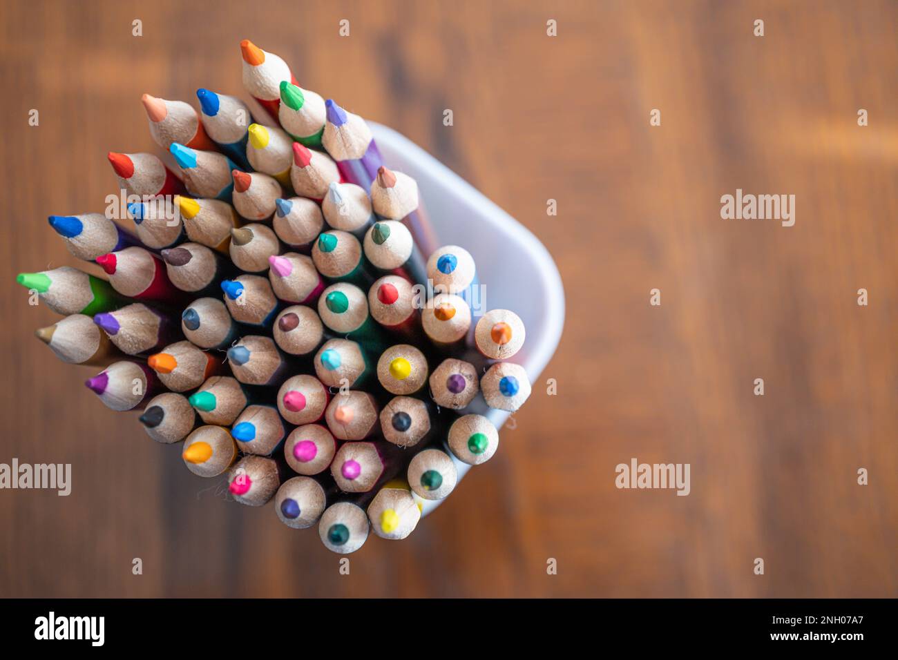 Collection of Coloring pencils in a cup container Stock Photo - Alamy
