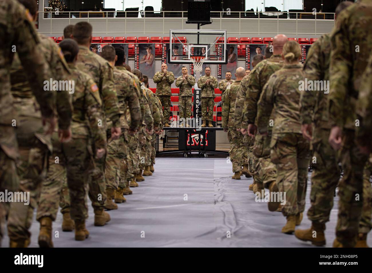 Honored guests applaud as Soldiers with Headquarters Battery, 45th ...